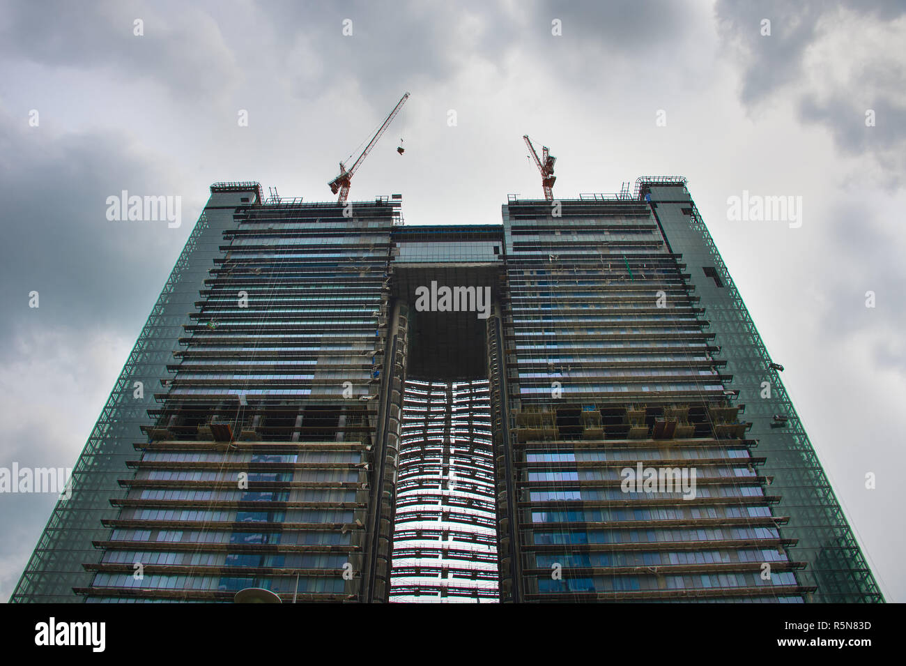 Construction of twin skyscraper Stock Photo - Alamy