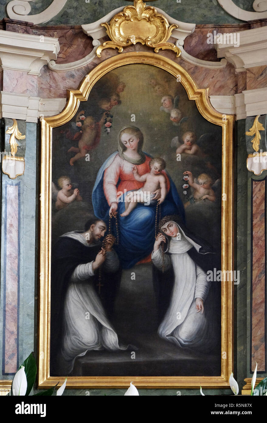 Our Lady of Holy Rosary, altarpiece in the Saint George church in Luson ...