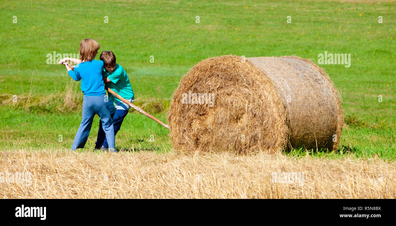 Moving A Hay Bale High Resolution Stock Photography and Images - Alamy