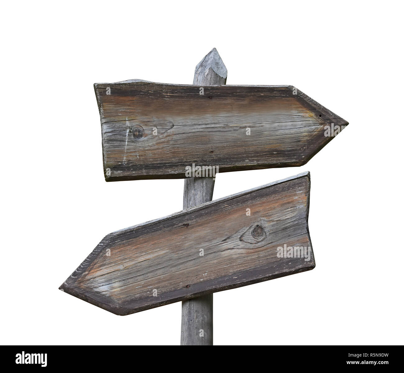 Old wooden road sign with two arrows isolated Stock Photo - Alamy