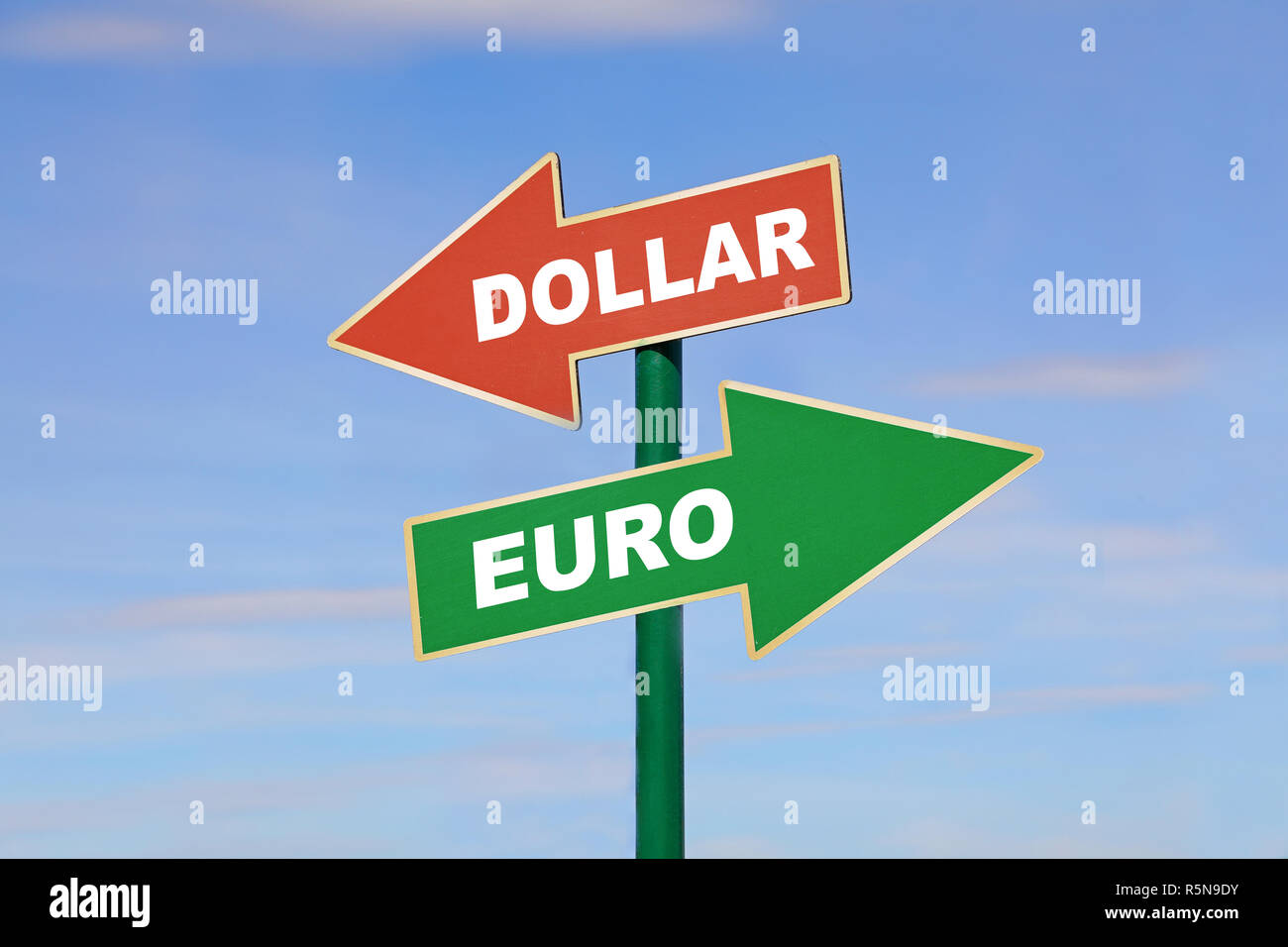 Road sign with two different arrows over blue sky Stock Photo - Alamy