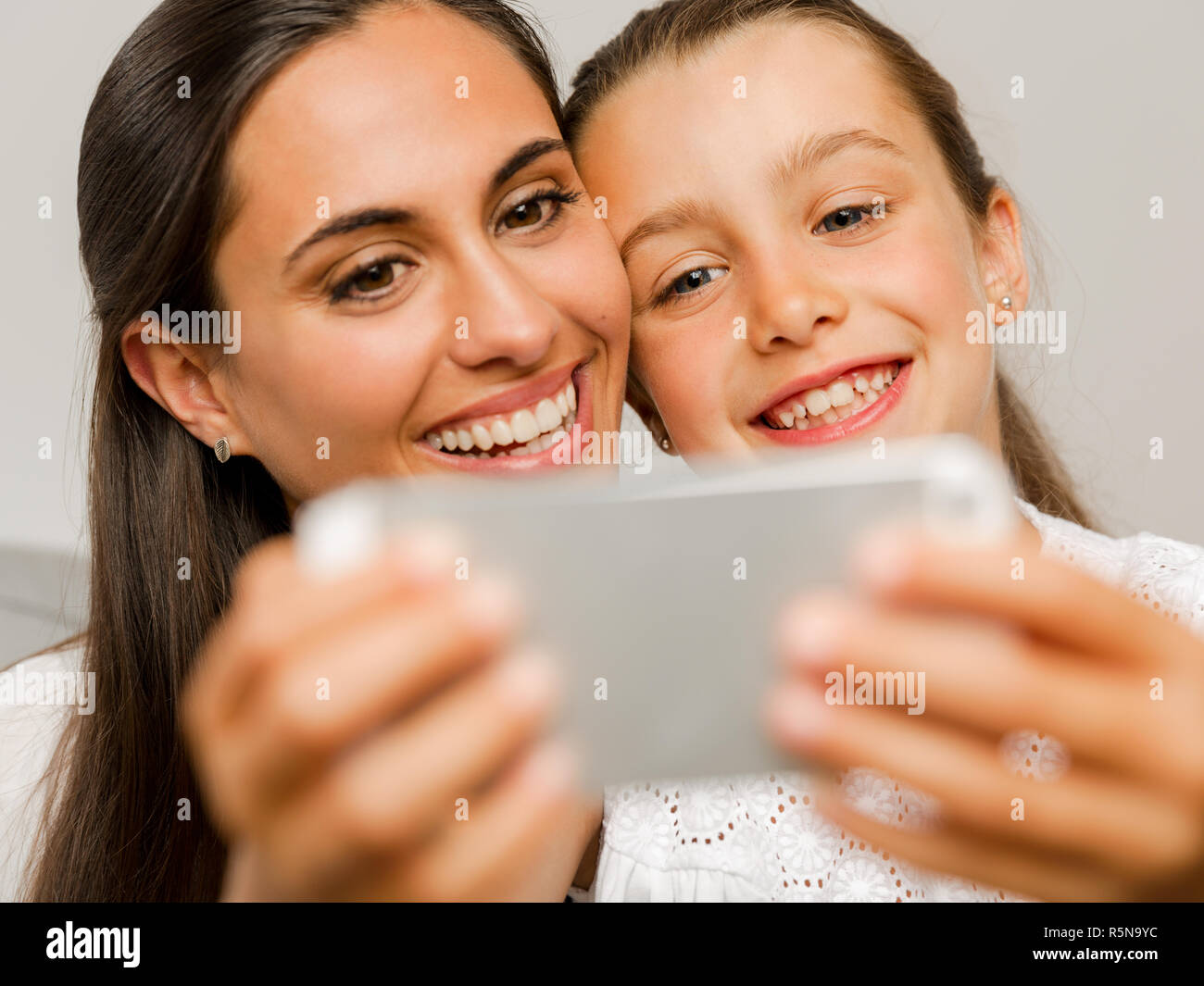 Mom and Daughter at home Stock Photo - Alamy