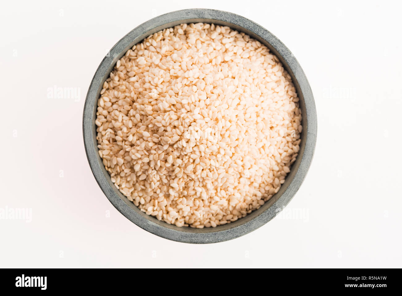 sesame seeds isolated on white background Stock Photo - Alamy