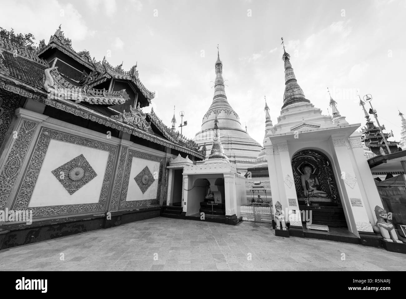 Black and white picture of charming golden temples at Shwedagon Pagoda ...