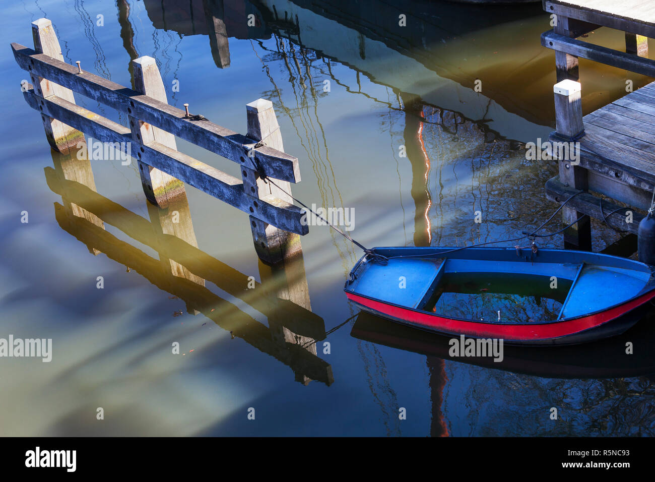 Moored rowing boat Stock Photo - Alamy