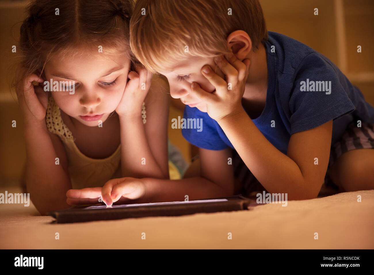 Boy reading cartoons hi-res stock photography and images - Alamy
