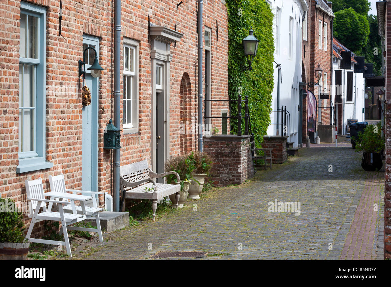 Old historical street with benches Stock Photo - Alamy
