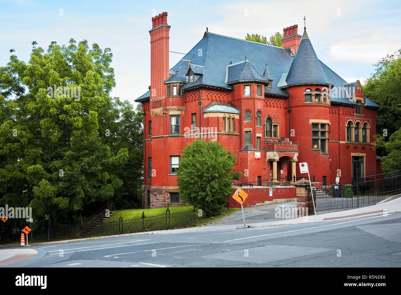 Old historical Victorian building with red brick walls in Montreal ...