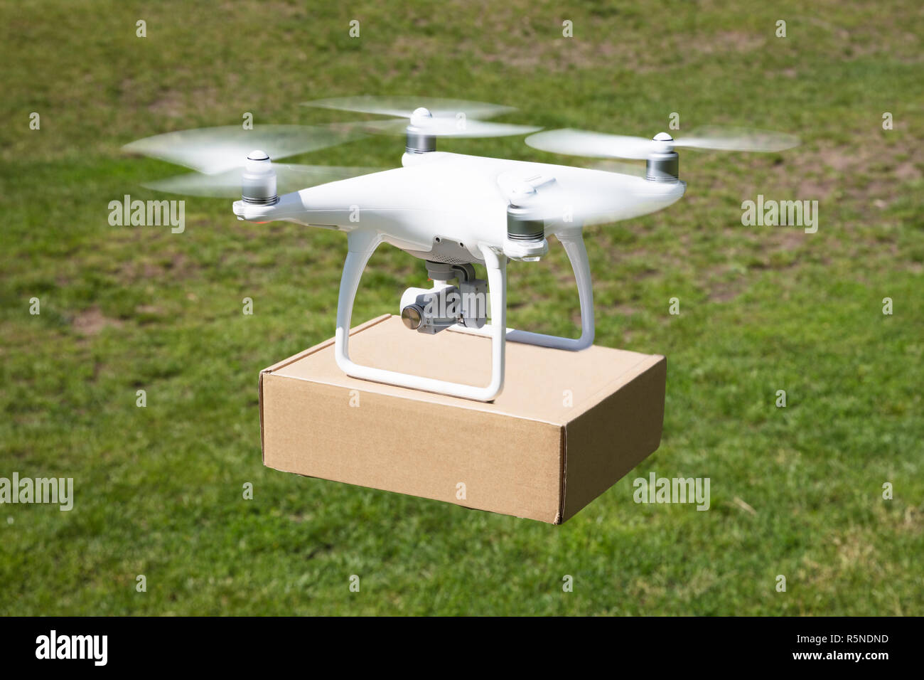 Drone carrying camera aerial hi-res stock photography and images - Alamy
