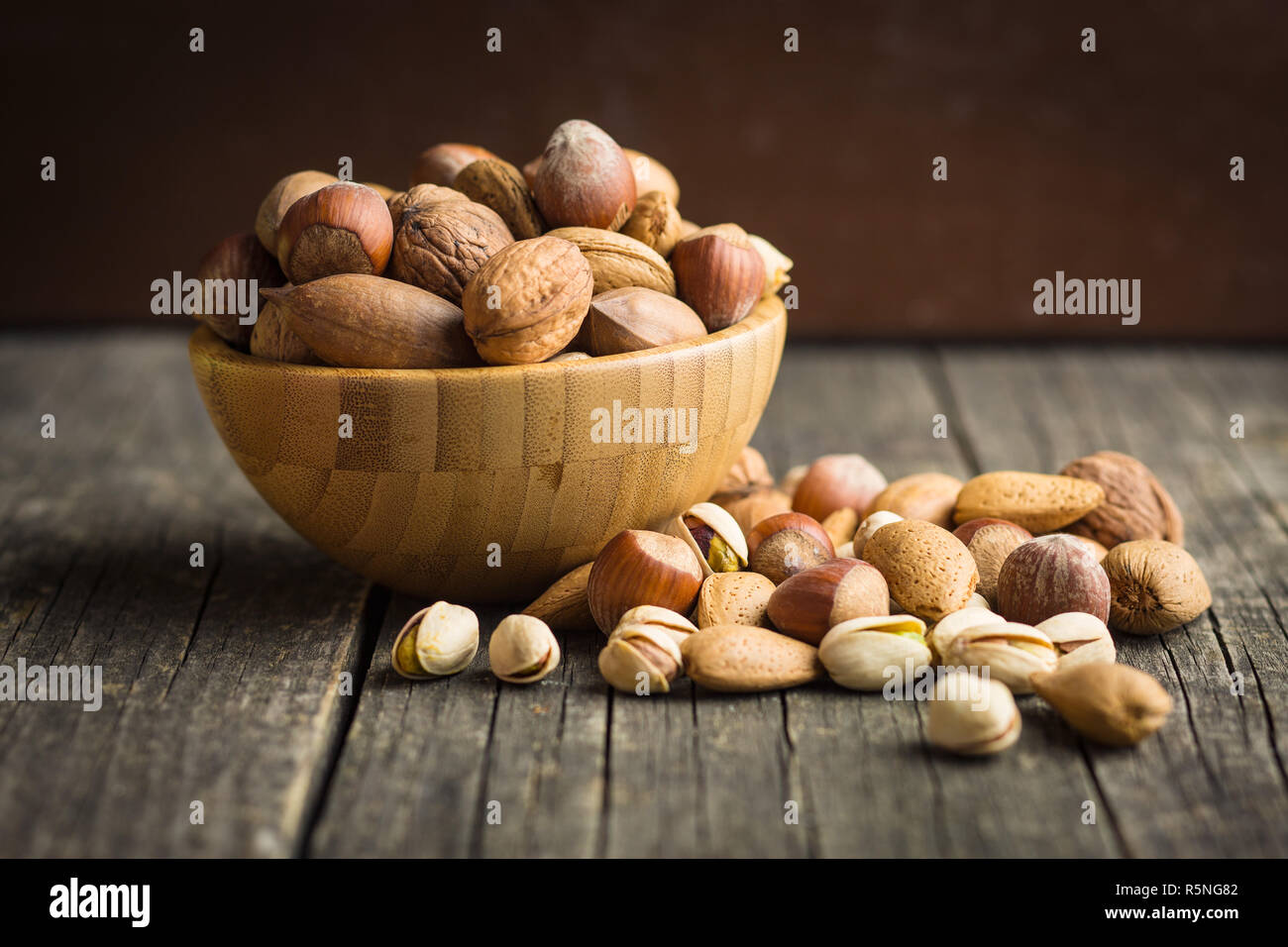 Different types of nuts in the nutshell Stock Photo - Alamy