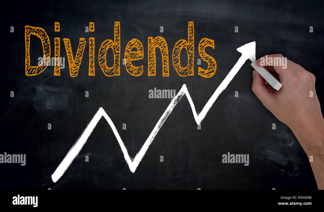 dividends and graph are written by hand on blackboard Stock Photo - Alamy