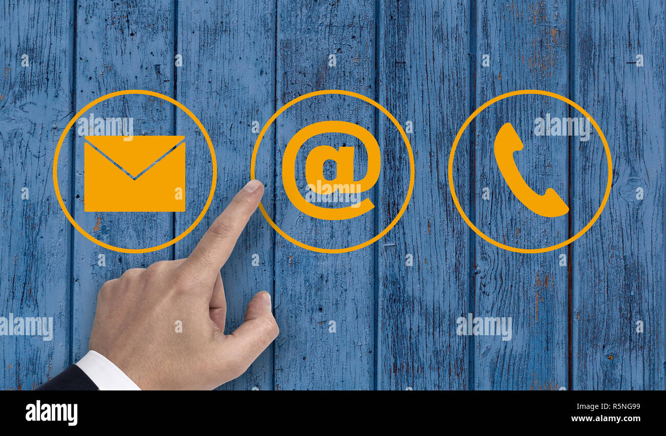 hand points to contact options icons email brief phone Stock Photo - Alamy