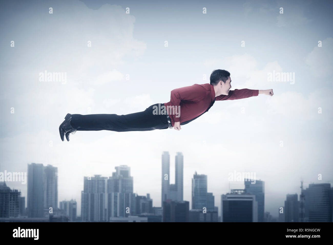 Business man flying Stock Photo - Alamy