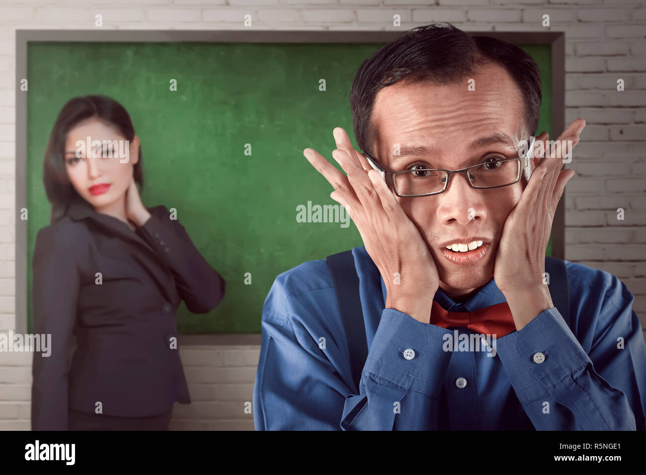 Asian nerd man looking shy hi-res stock photography and images - Alamy