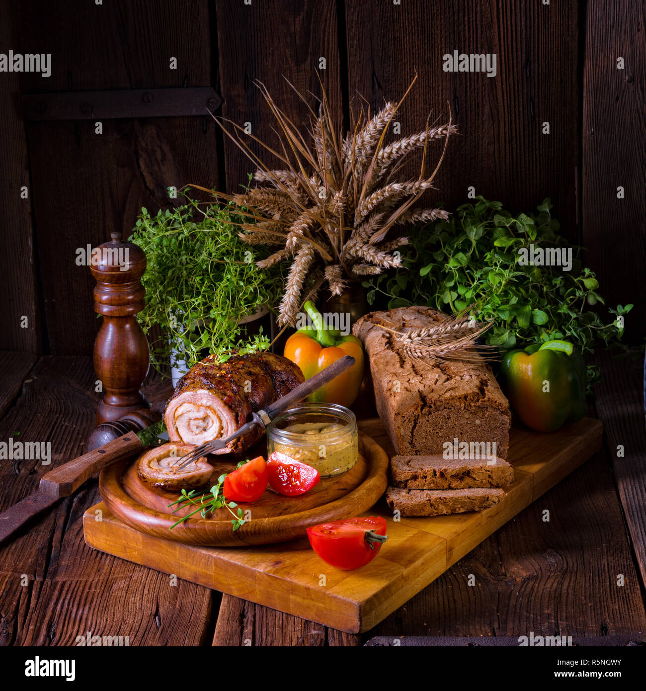 rolling roast fullly with dried fruit and bacon Stock Photo - Alamy