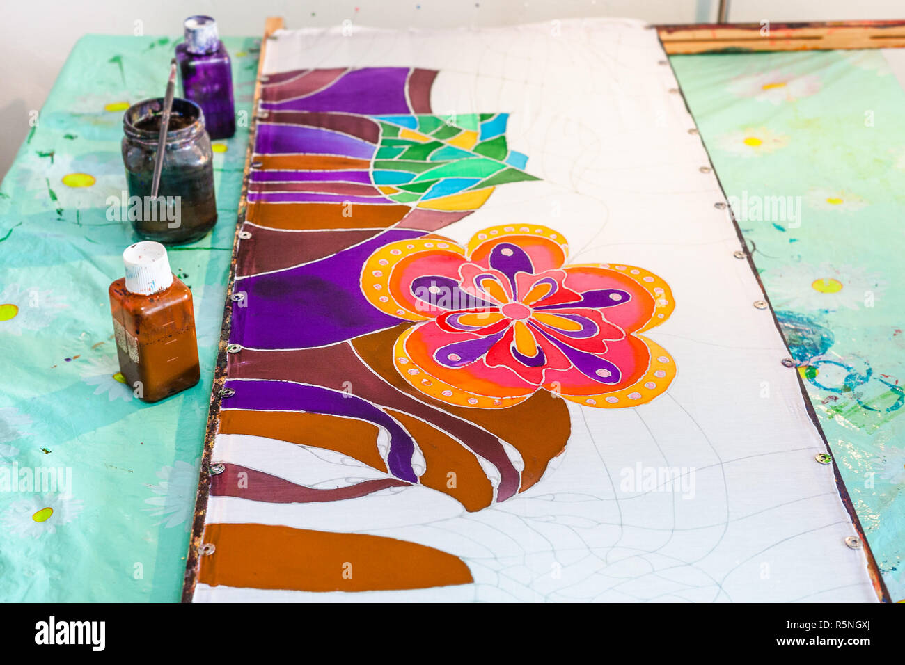 batik painting on silk fabric stretched on frame Stock Photo - Alamy