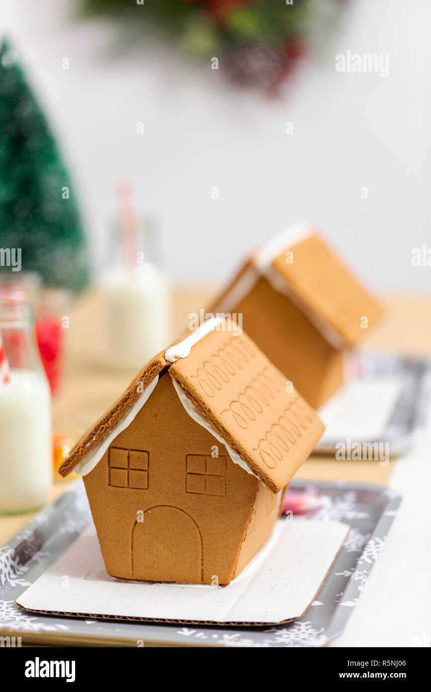 Kids party to decorate small gingerbread houses with candies Stock ...