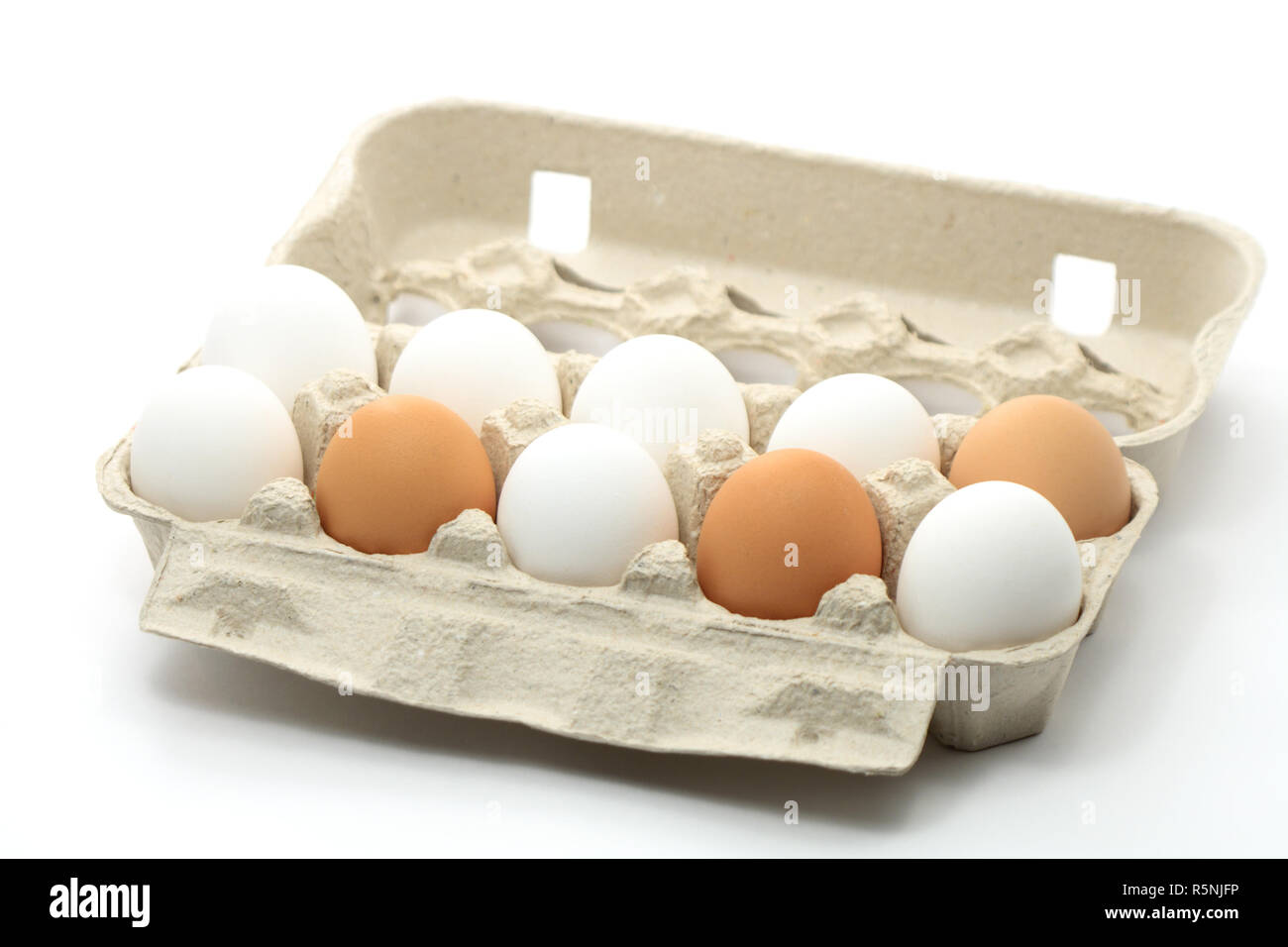 Open carton box with ten eggs isolated on white background Stock Photo ...