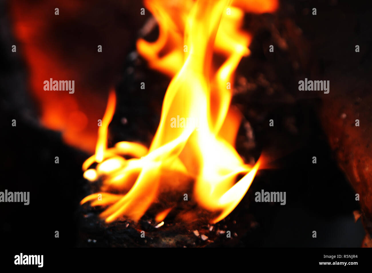 Abstract background with nice single flame on dark Stock Photo - Alamy