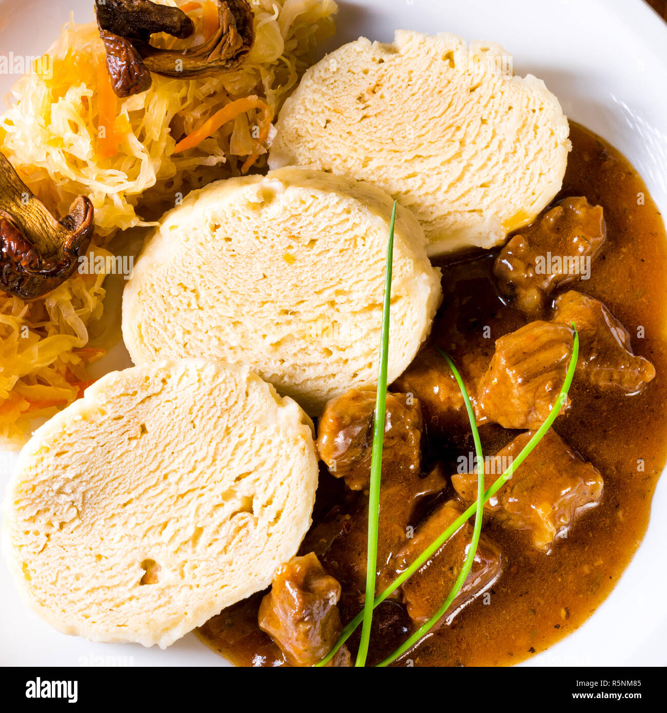 original czech dumpling with goulash Stock Photo - Alamy