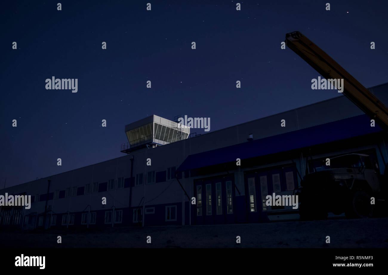 Night starry sky at a construction site. Tower building airport and ...