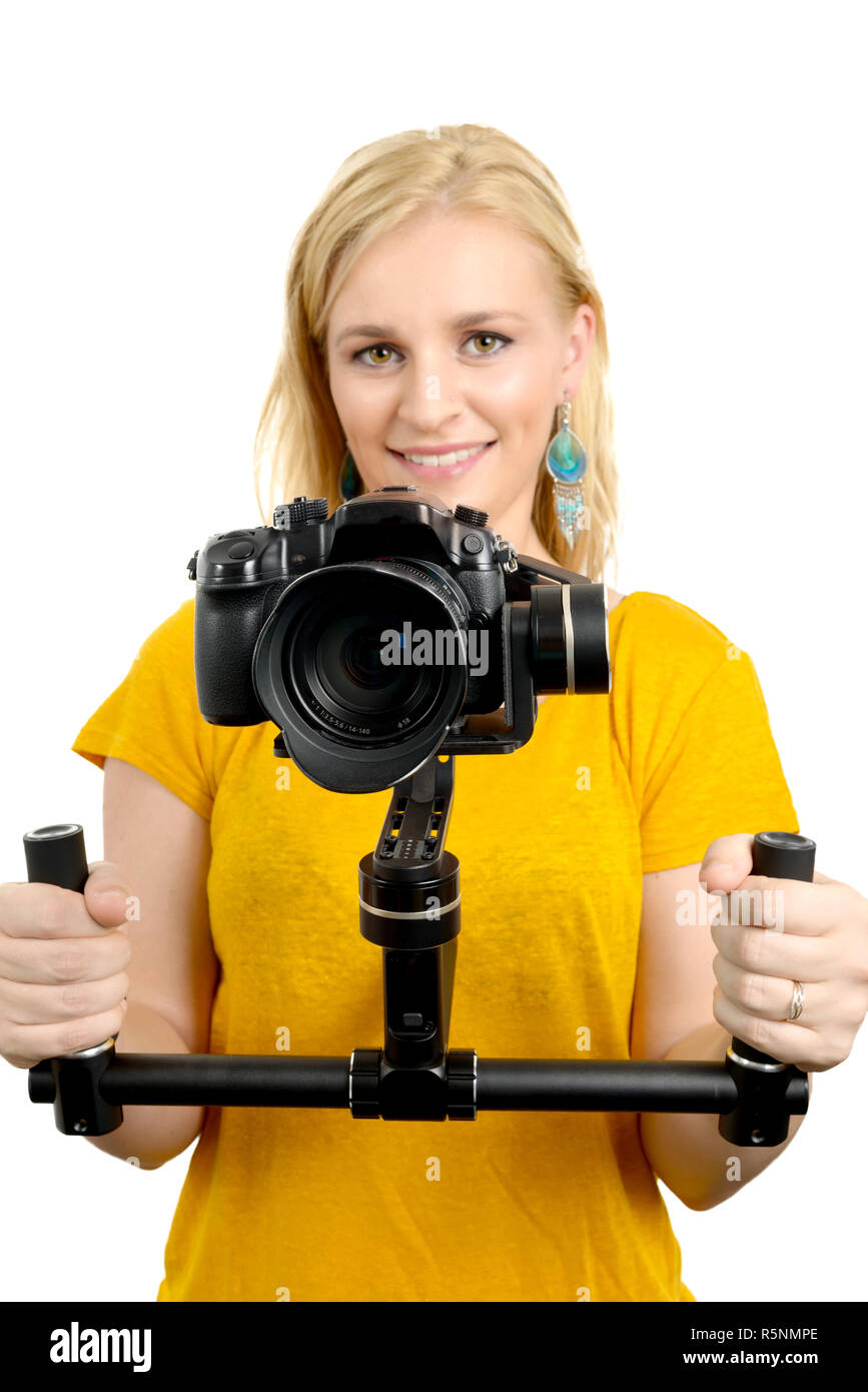 woman videographer using steady cam, on white Stock Photo - Alamy
