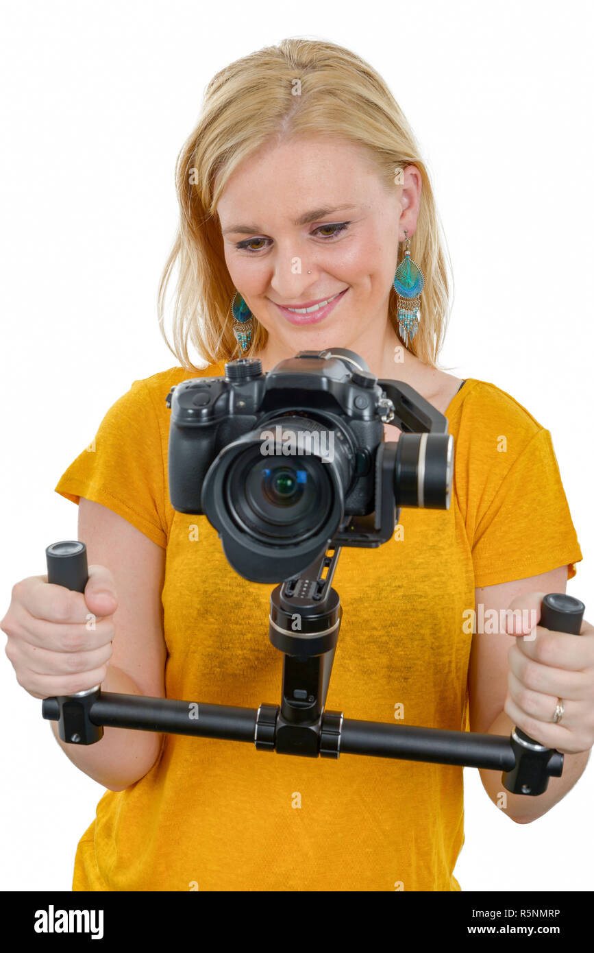 woman videographer using steady cam, on white Stock Photo - Alamy