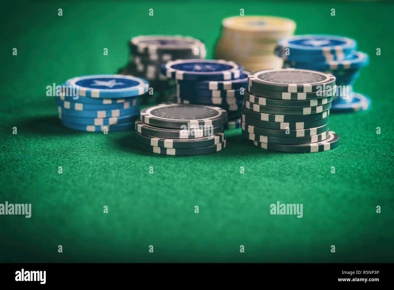 Piles of poker chips hi-res stock photography and images - Alamy