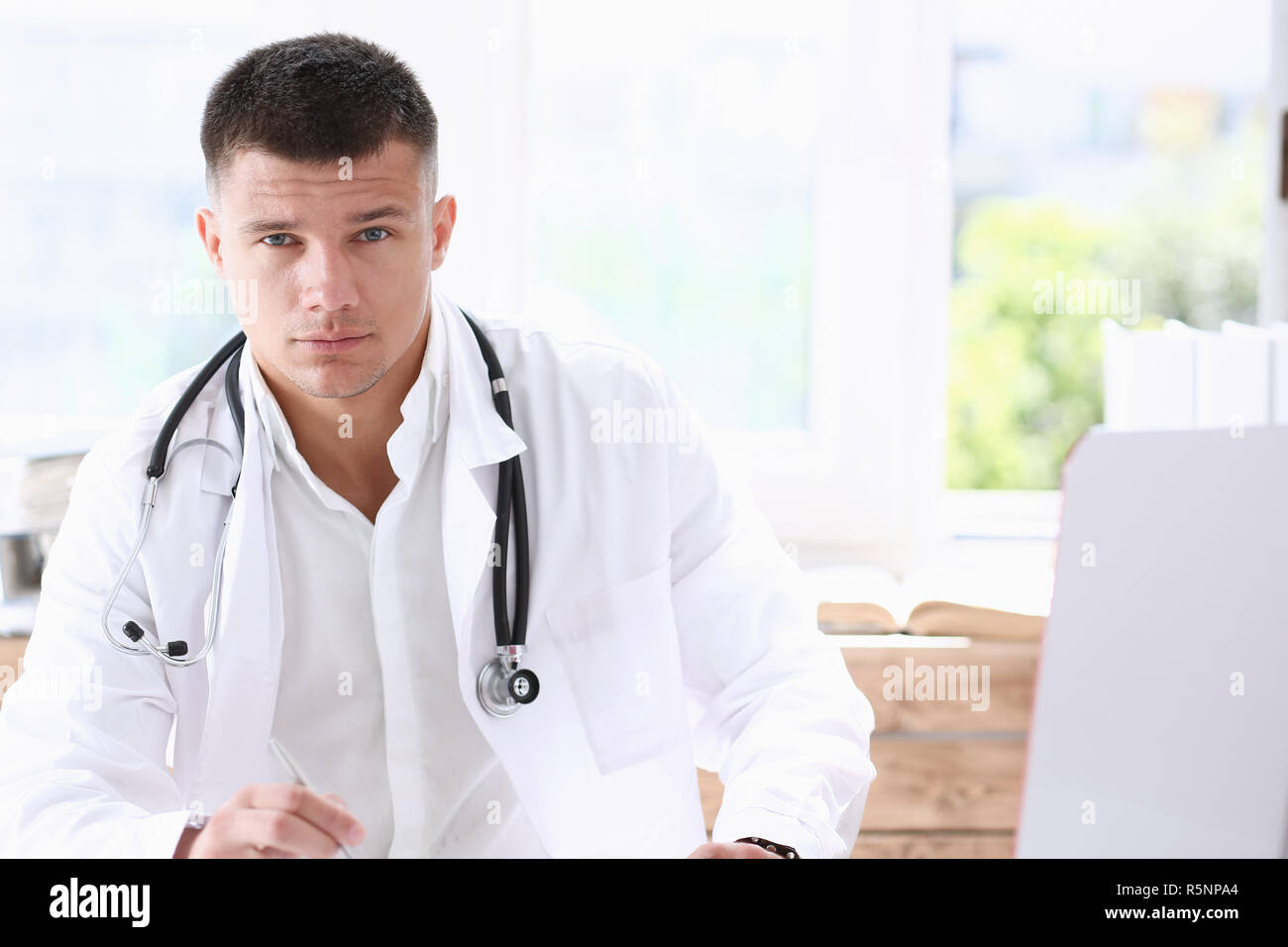 Doctor sit hi-res stock photography and images - Alamy