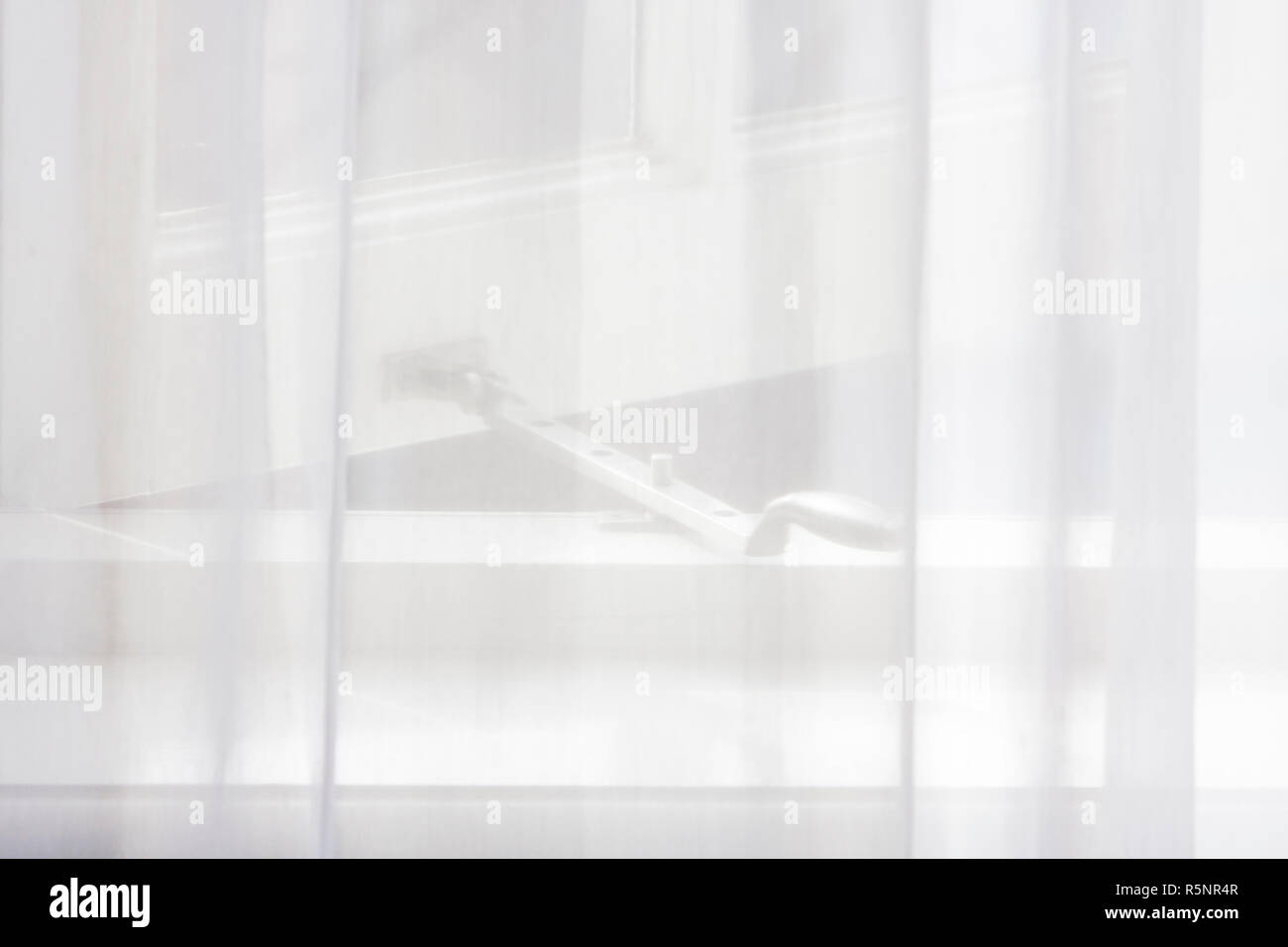 Open window behind curtain Stock Photo - Alamy