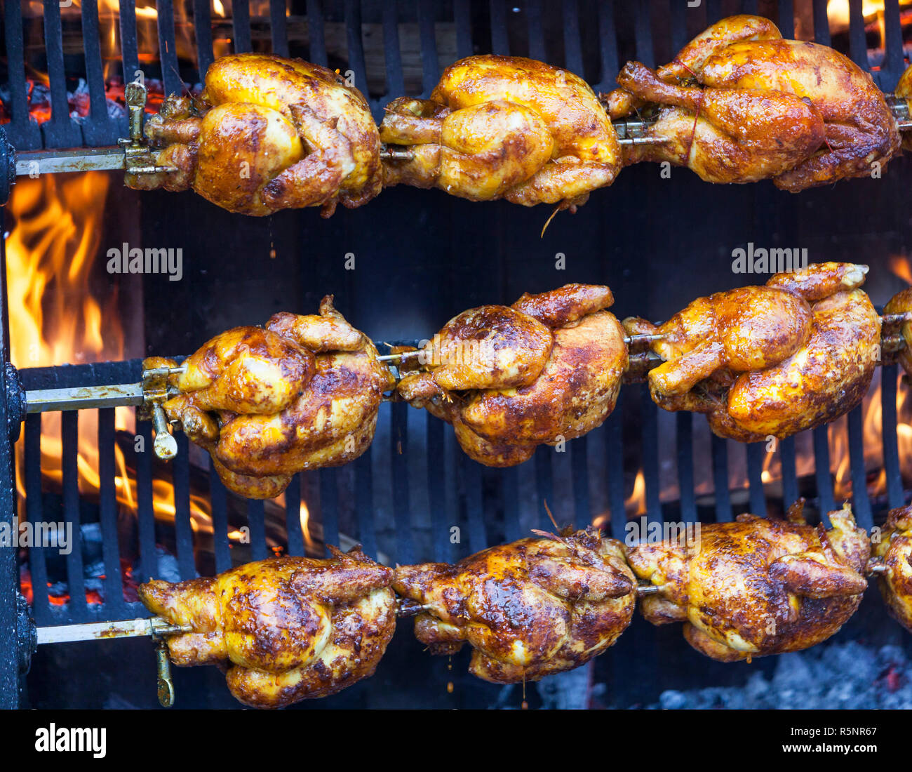 Chicken on a spit Stock Photo - Alamy