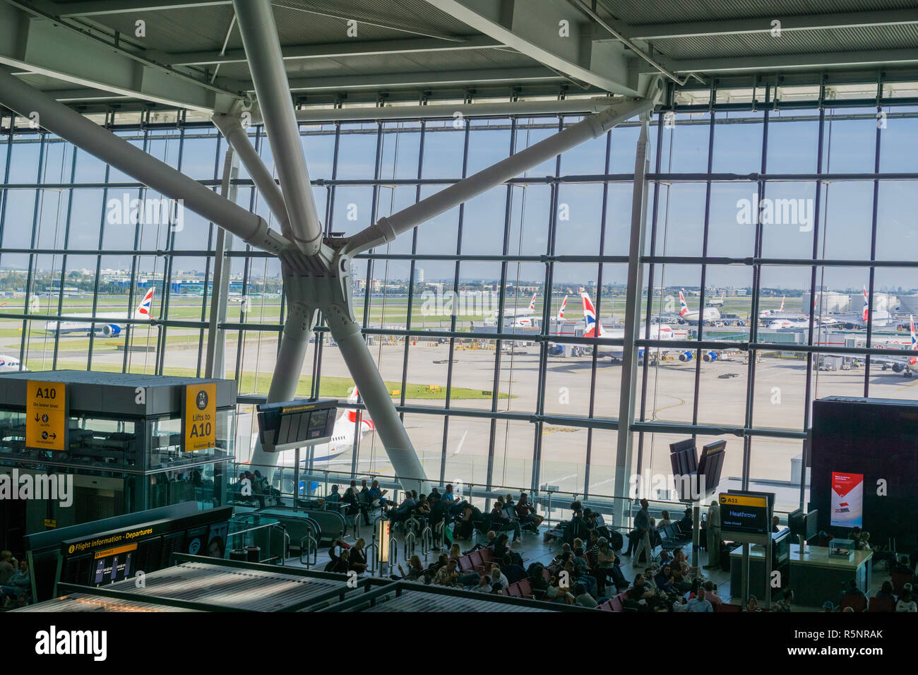 Heathrow airport waiting area hi-res stock photography and images - Alamy