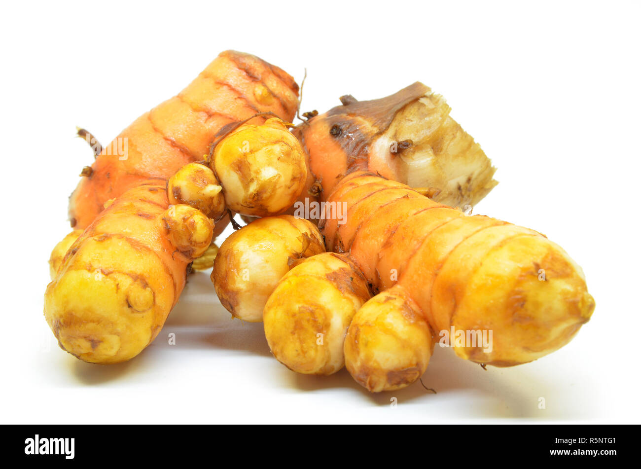 Turmeric rhizome on white background Stock Photo - Alamy