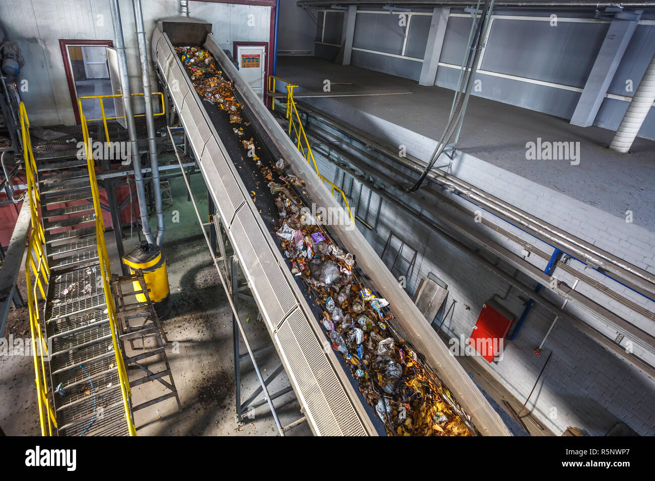 moving conveyor transporter on Modern waste recycling processing plant ...