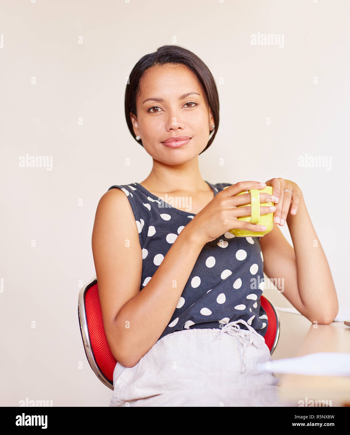 Taking a quick coffee break Stock Photo - Alamy