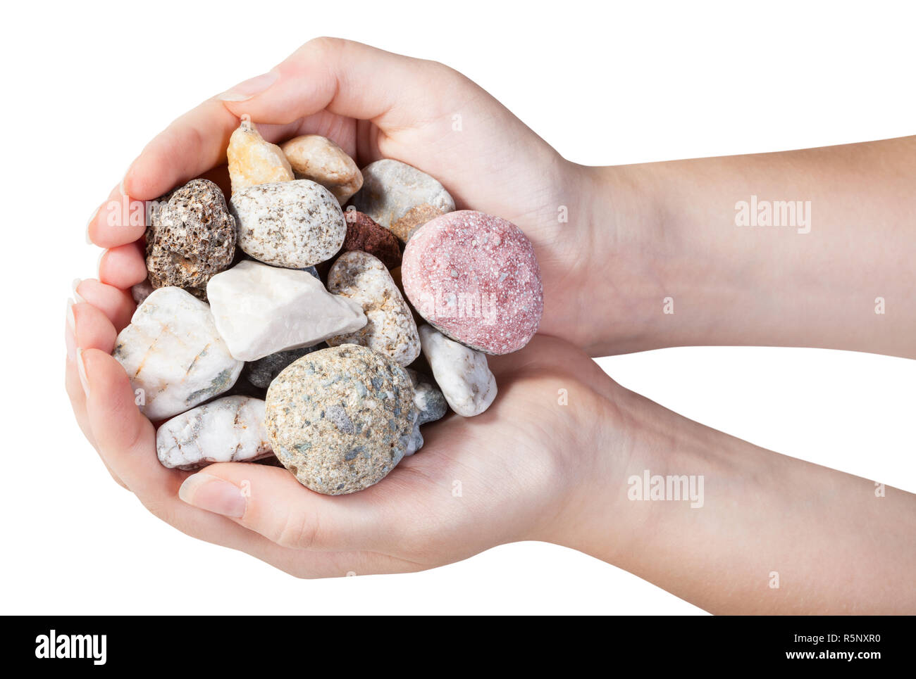 top view of various mineral pebbles in handful Stock Photo - Alamy