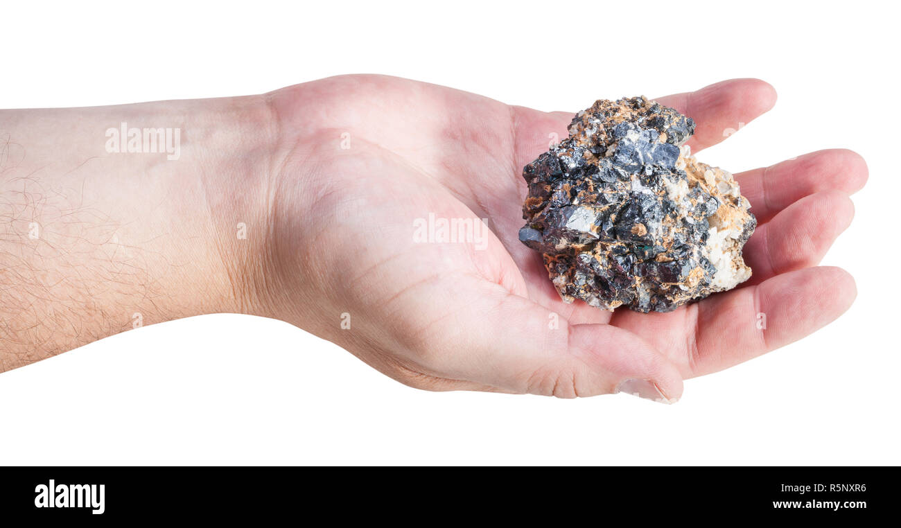 side view of zinc and lead ore on male palm Stock Photo - Alamy