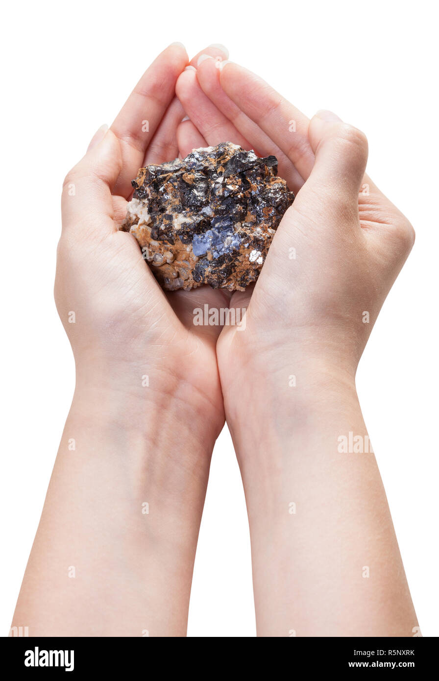 above view of zinc and lead mineral ore in handful Stock Photo - Alamy
