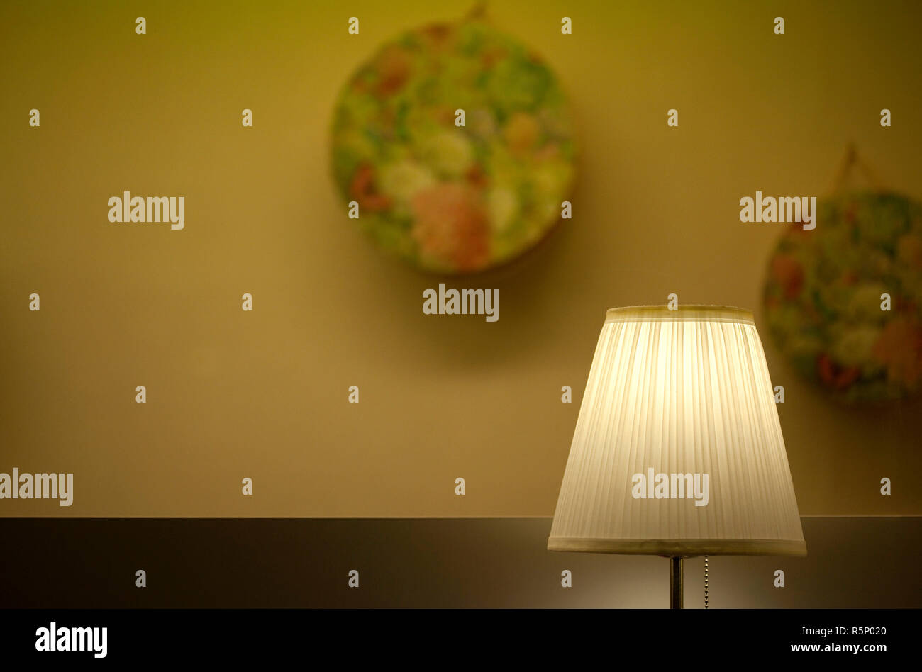 Lamp and plates in a lobby Stock Photo - Alamy