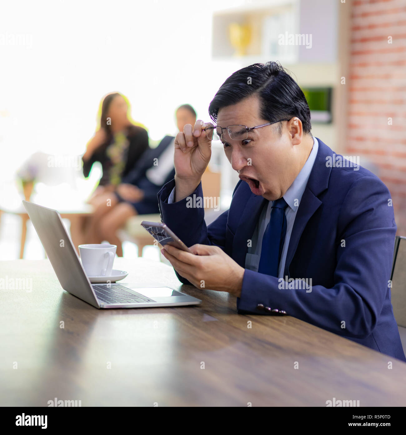 Portrait of Asian Businessman celebrate and glad for his success in ...