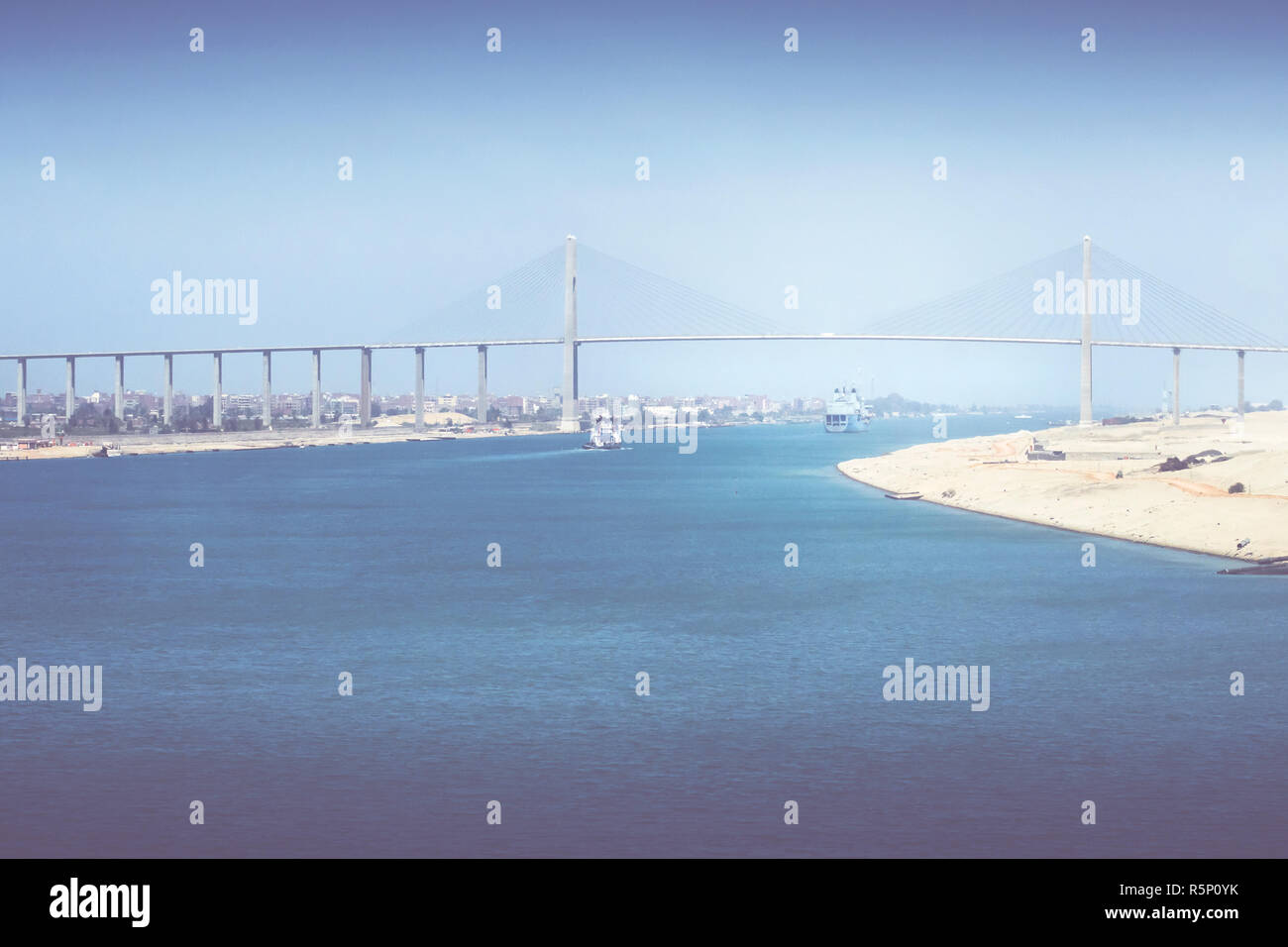 the suez canal at el qantara with ships and mubarak peace bridge Stock ...