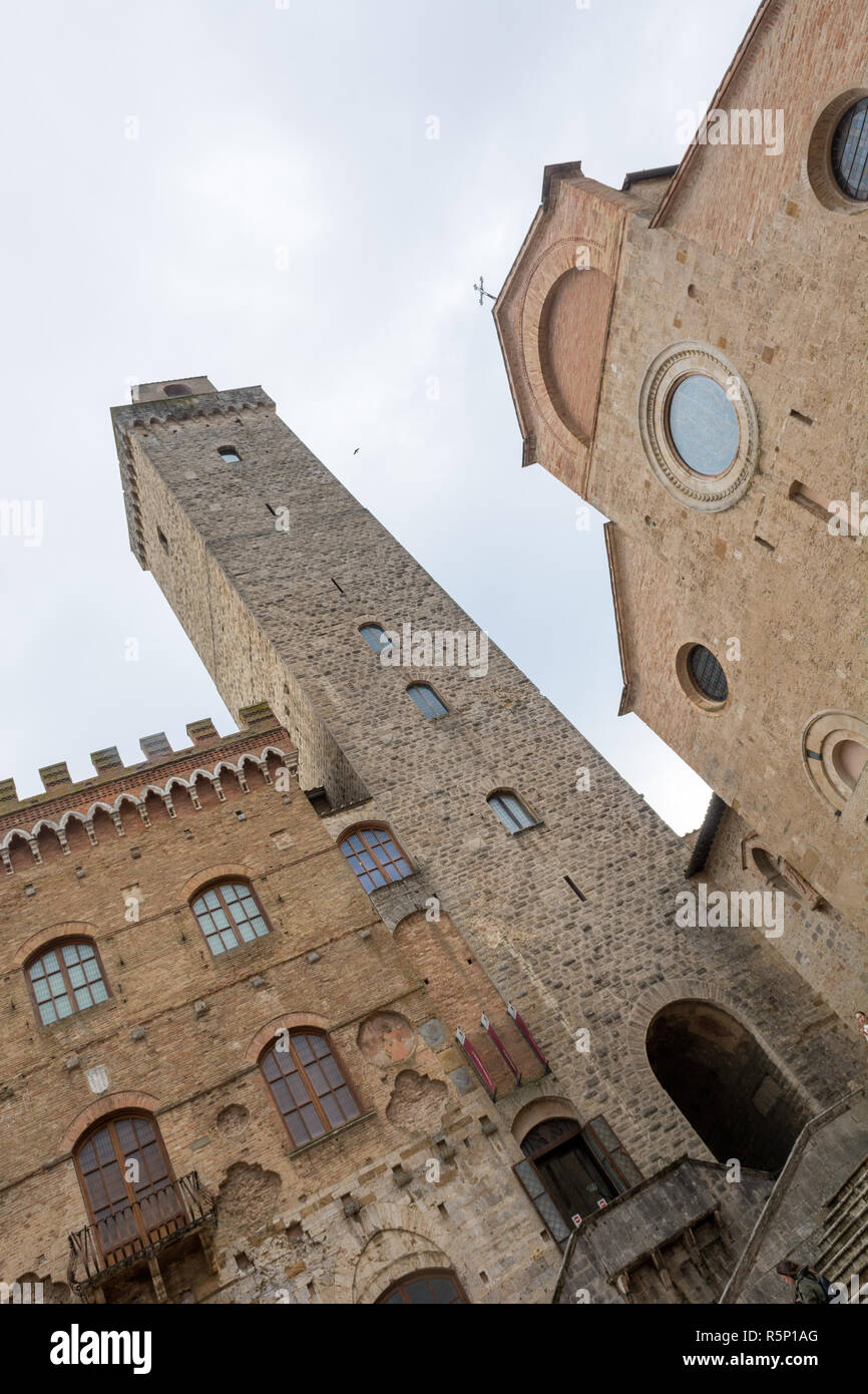 Spectacular stone built tower raising above medieval town Stock Photo ...