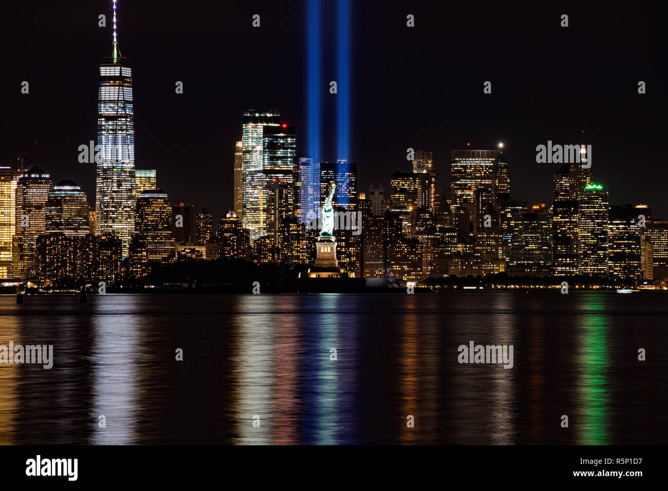 9/11 Memorial Beams with Statue of Liberty and Lower Manhattan Stock ...
