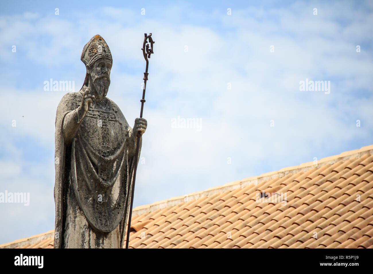 Statue of St. John on the North Town Gate of old town Trogir, Croatia ...