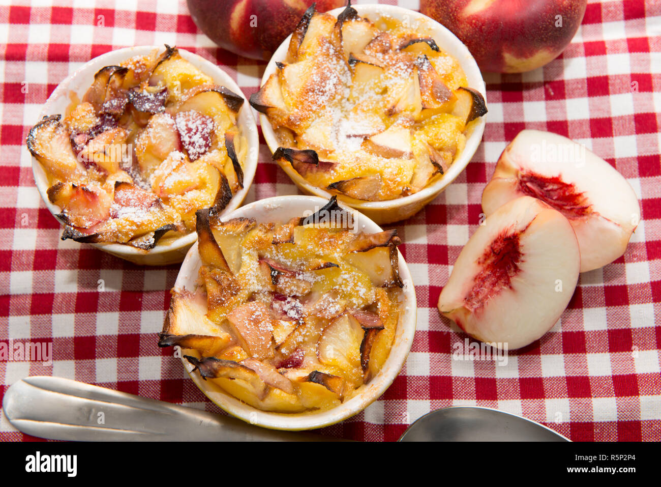 small baked peaches cakes Stock Photo - Alamy