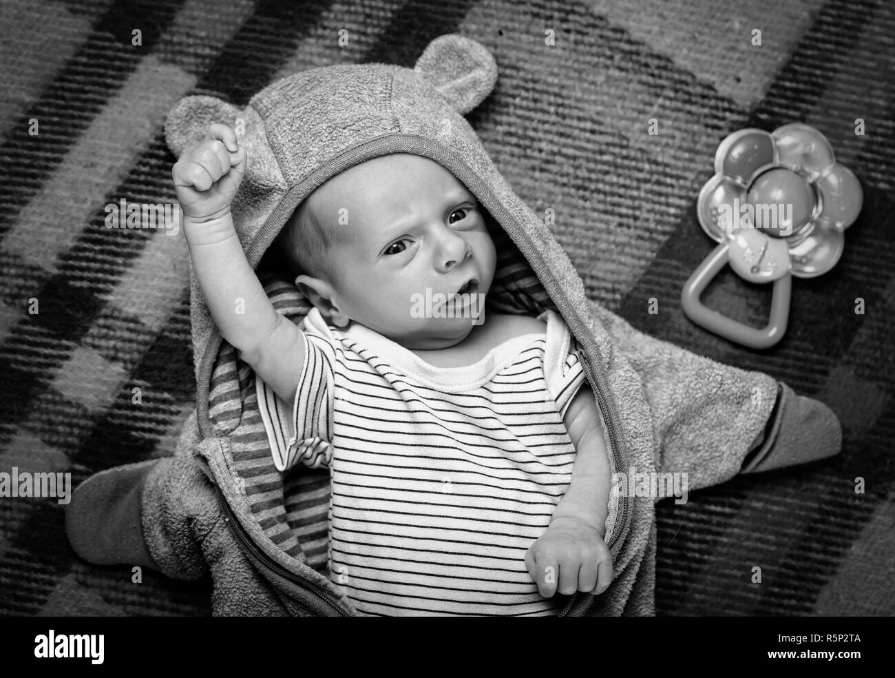 Black and white. Newborn baby on couch at home Stock Photo - Alamy