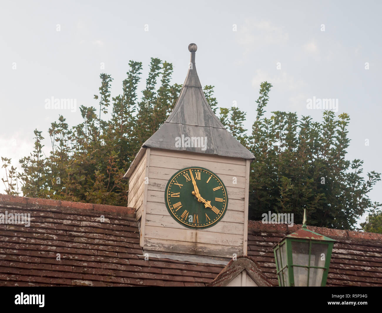 town village rural small roof tower communal clock Stock Photo - Alamy