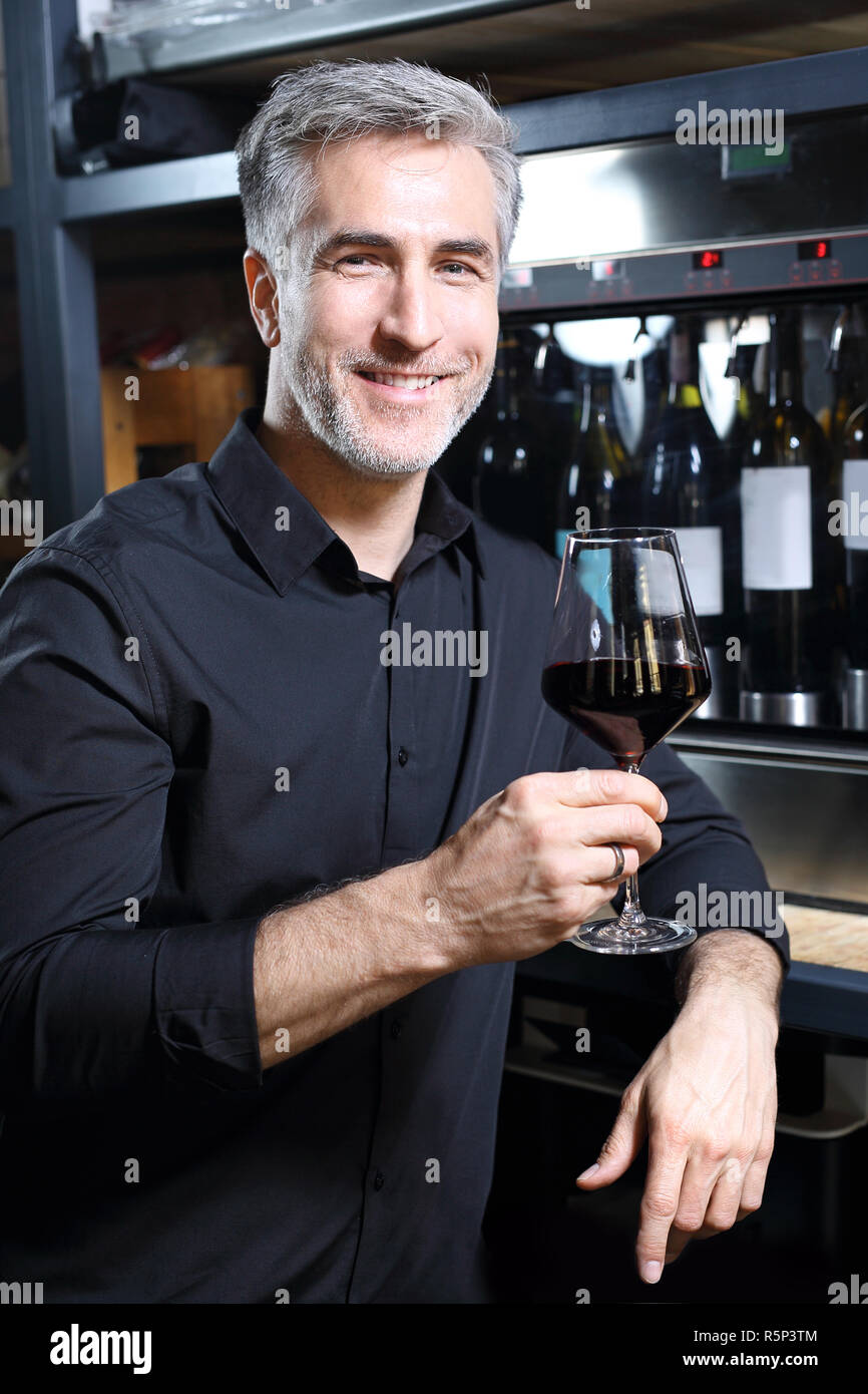 Sommelier tasting red wine. Wine cellar, men tasting red wine ...