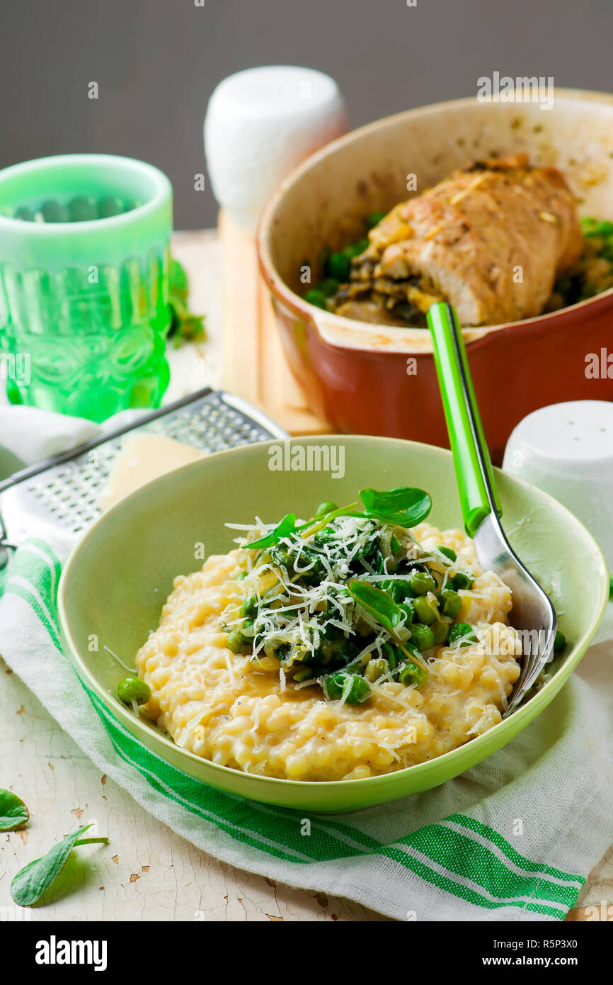 Pasta risotto with spring vegetables.selective focus Stock Photo - Alamy
