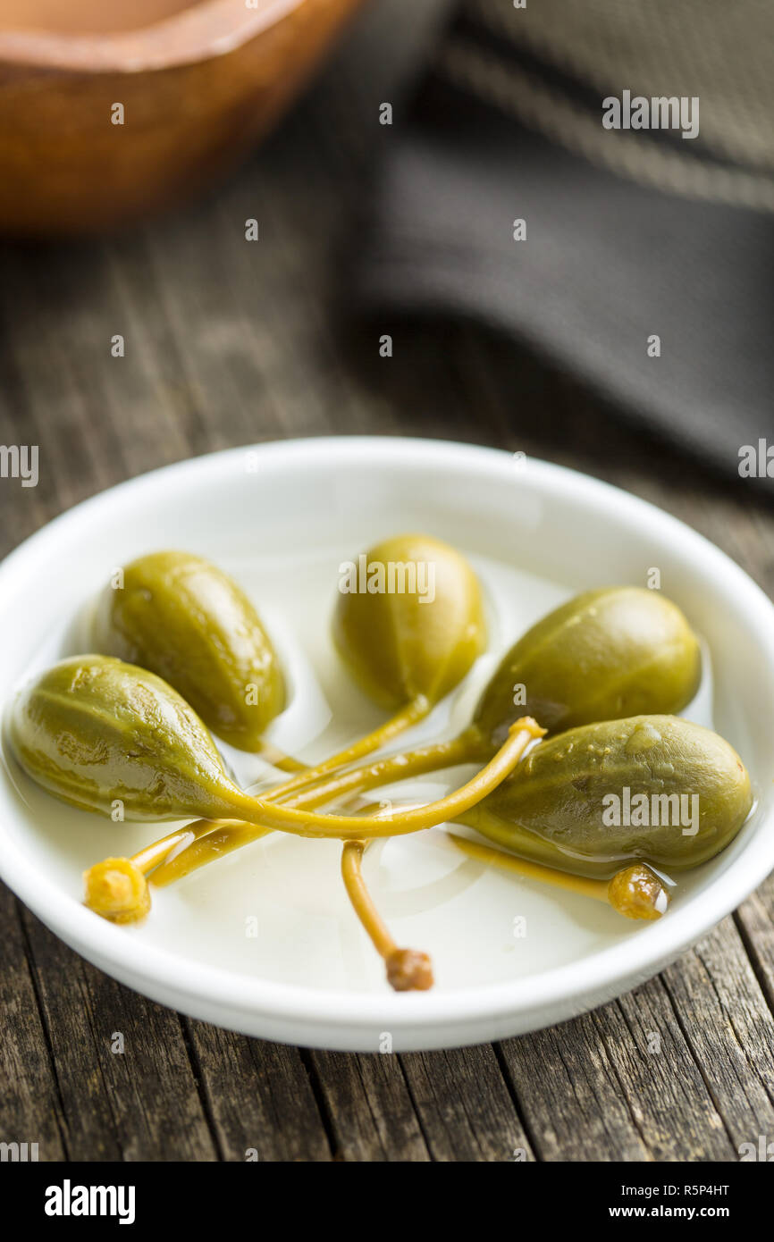 Pickled caper berries Stock Photo - Alamy